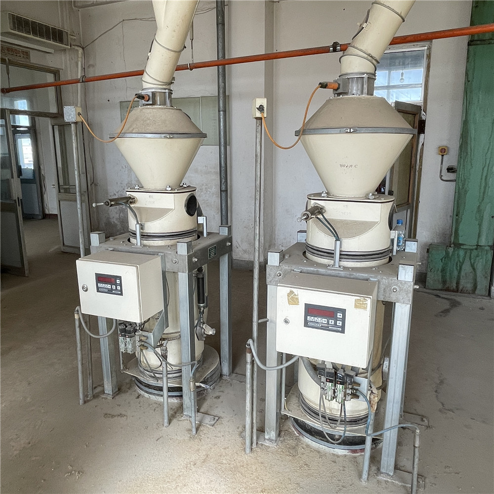 For Sale Used Buhler Spout Scales